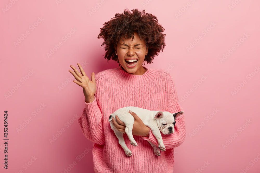 Emotions, people and animals concept. Energetic happy woman has ...