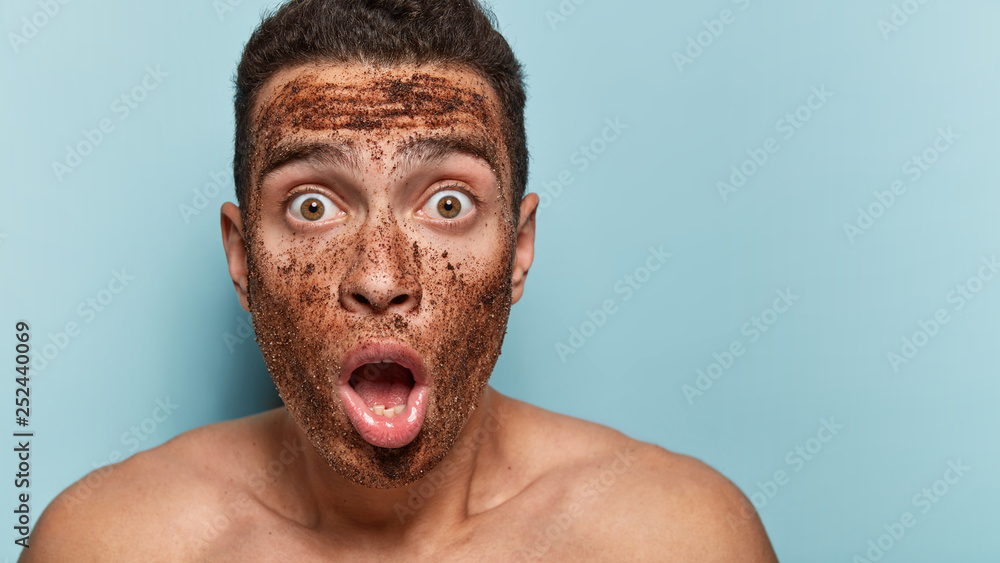 Stupefied emotional young man keeps jaw dropped from amazement ...