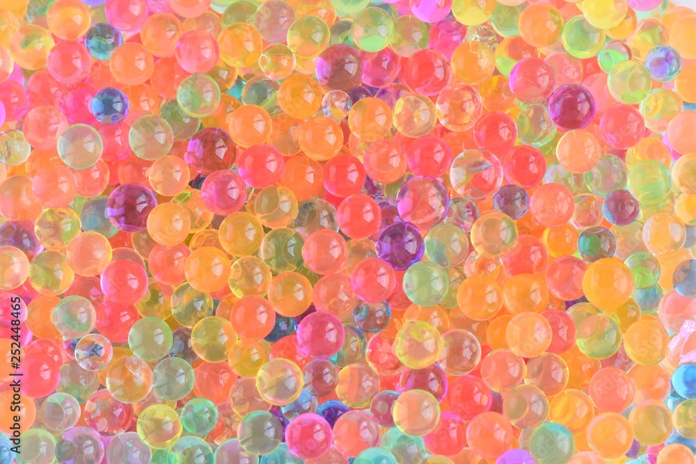 Colorful silica gel background with selective focus. Hydrogel rainbow ...