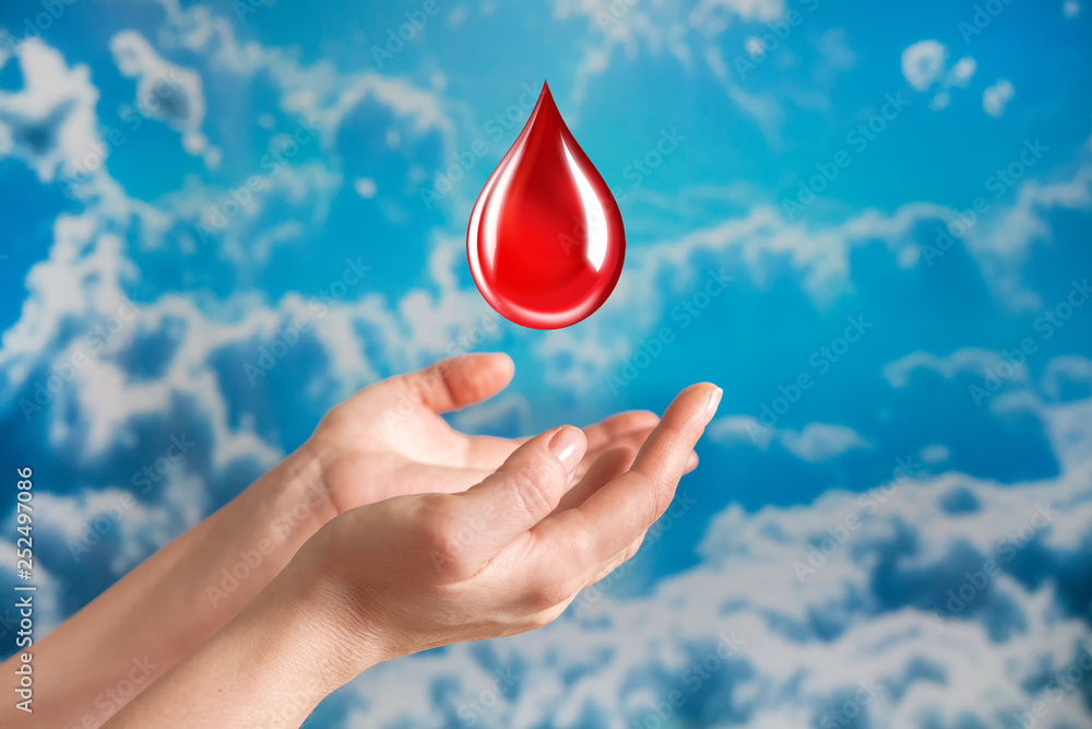 hand gives a red heart to a hand - blood donation,world blood donor day ...