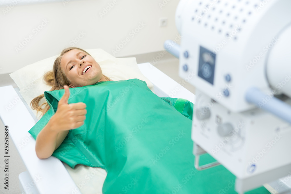 Doctor performing x-ray scanning for patient Stock Photo | Adobe Stock