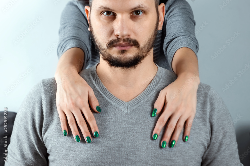 Sexy woman, hands with green nails hugging a man. Businessman, female ...