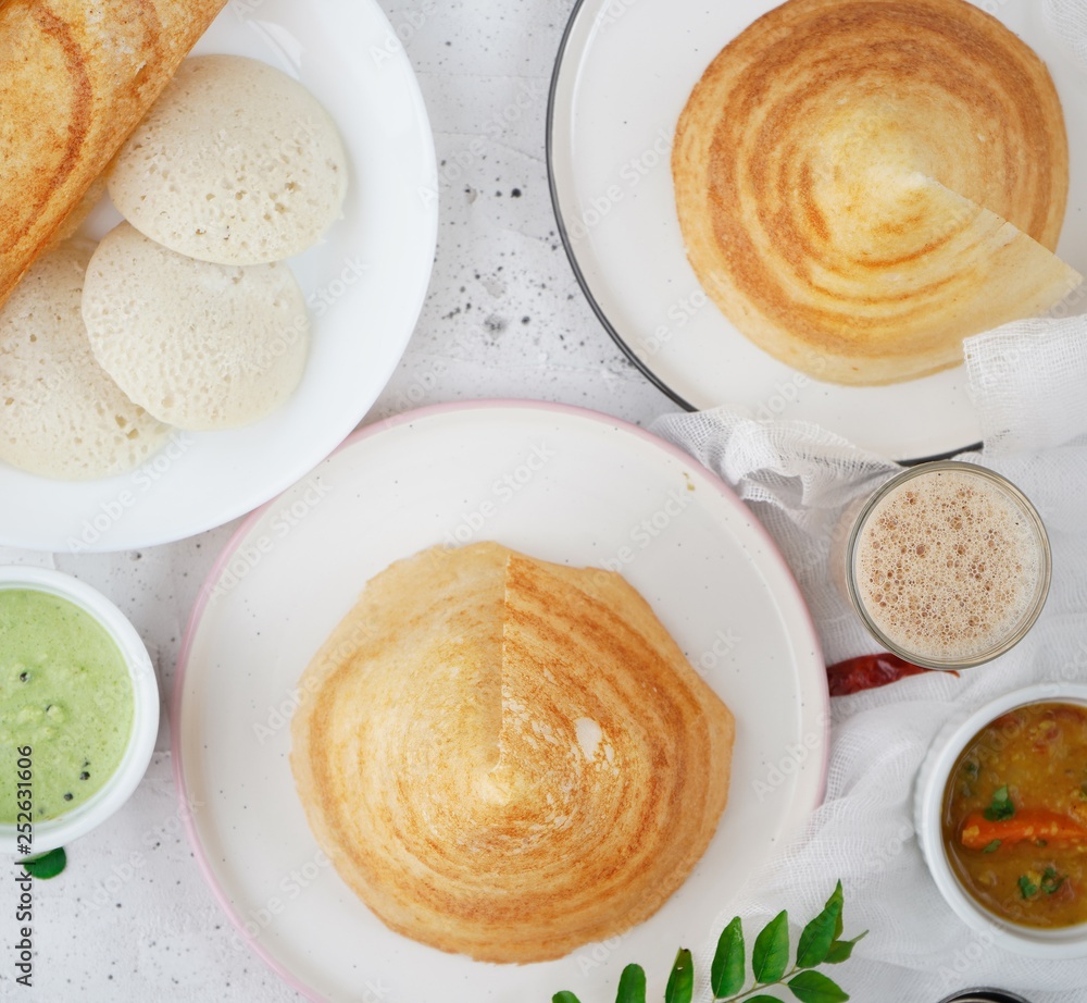 South Indian breakfast cone shaped dosa Idli sambar and chtney ...
