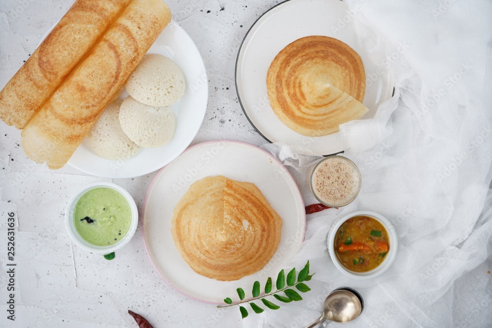 South Indian breakfast cone shaped dosa Idli sambar and chtney ...