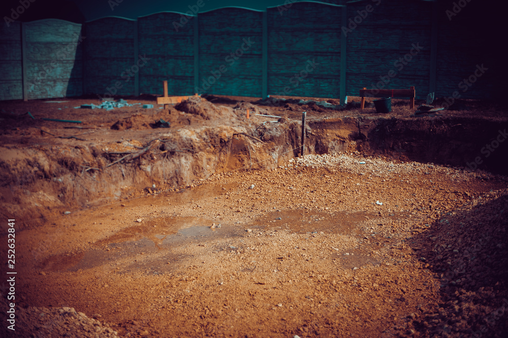 Backfilling of the excavation under the foundation slab. Construction ...