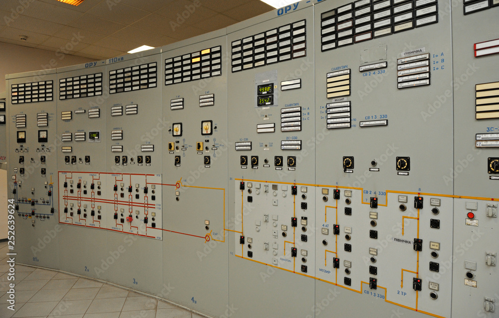 Main control board in a control operations room of the reactor of the ...