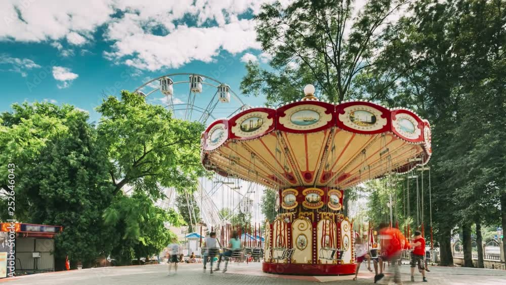 Rotating High Speed Carousel Merry-Go-Round In City Amusement Park ...