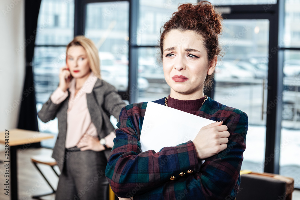 Accountant crying after job interview with strict businesswoman Stock ...