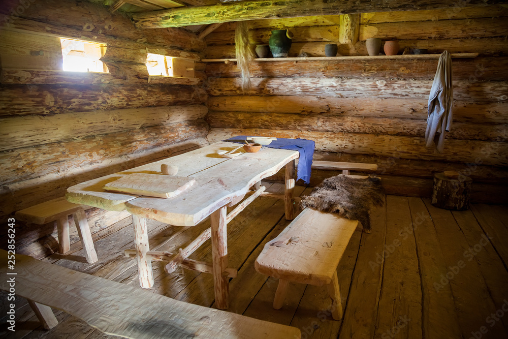dining room in the ancient wooden peasant hut Stock Photo | Adobe Stock