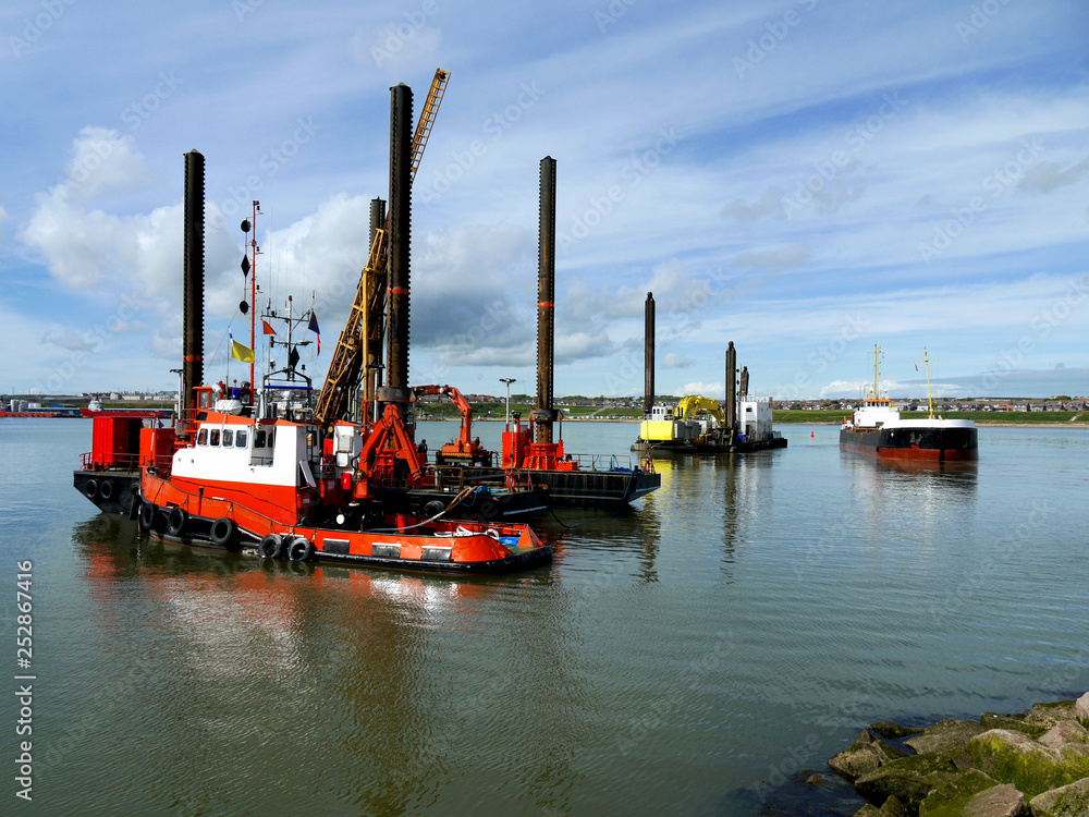 Port Construction Project vessels engaged in harbour reclamation work ...