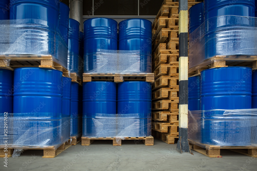 Toxic waste/chemicals stored in barrels at a plant - cans with ...