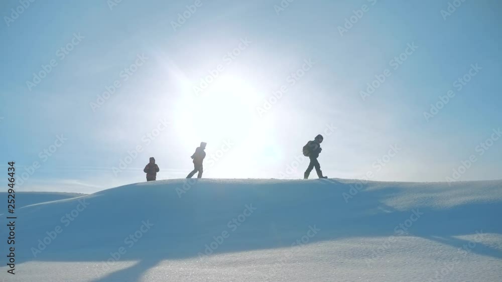teamwork. men tourists climbing walking top mountains rocks peak group ...