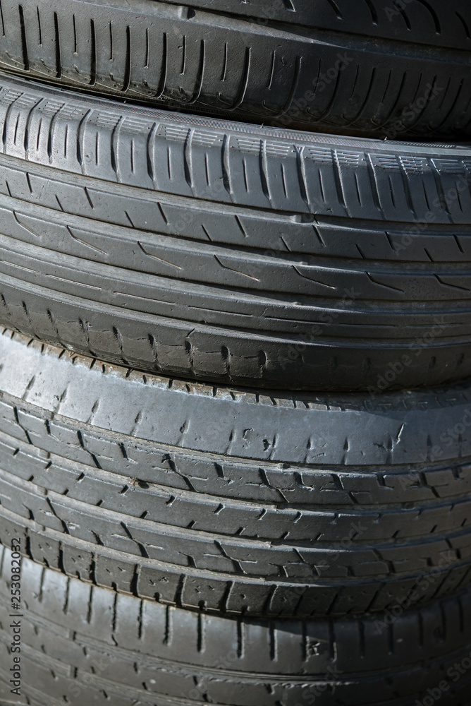 Stocked car tires, old and ready to be recycled, detail Stock Photo ...