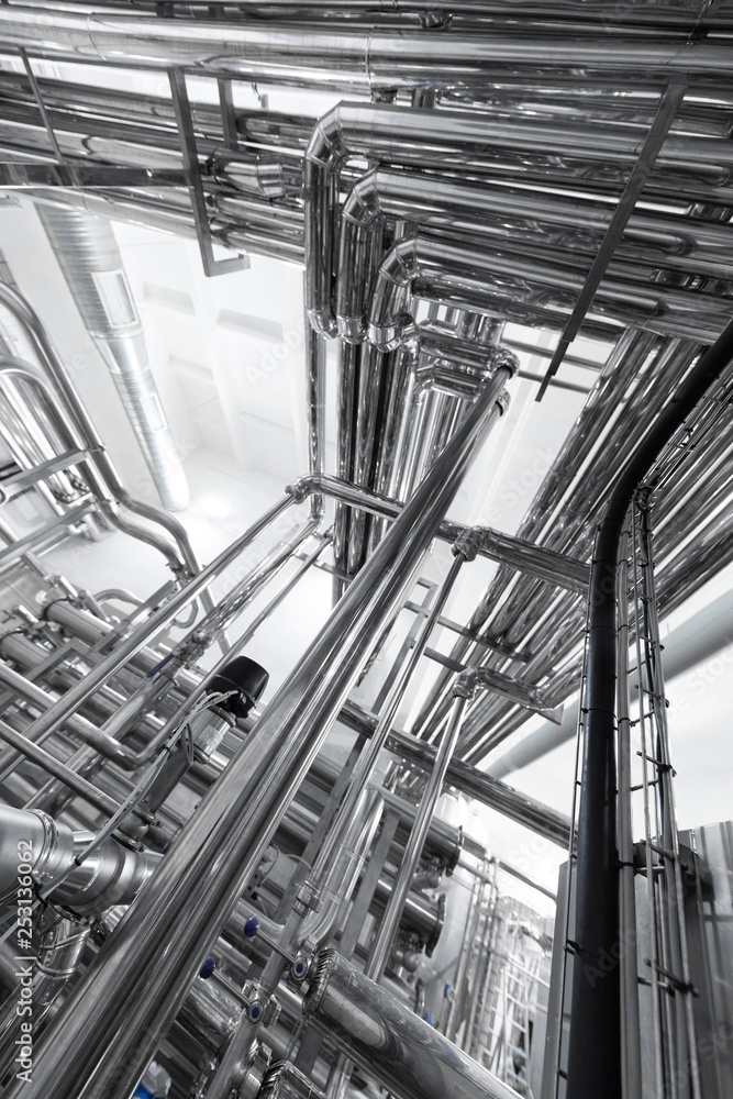 Steel water pipeline, chrome pipes, pipe lines in plant workshop ...