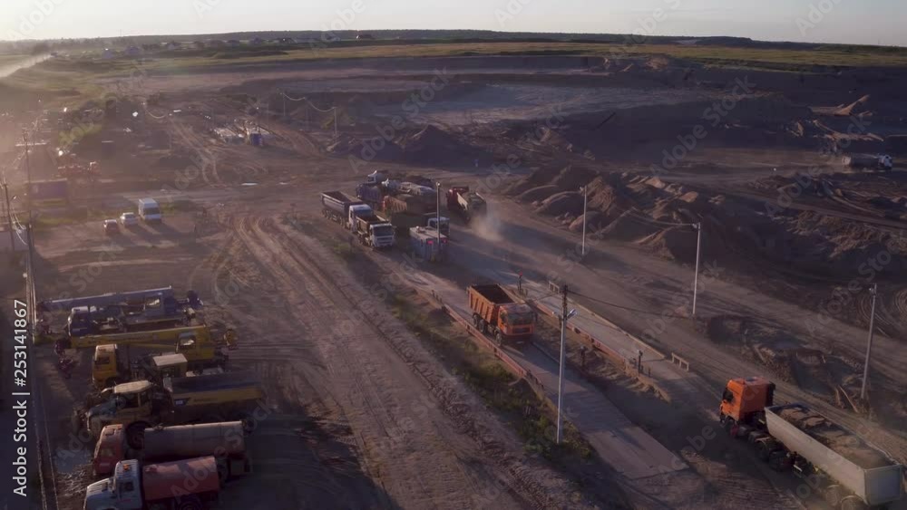 Extraction of construction sand at the quarry. Loading construction ...