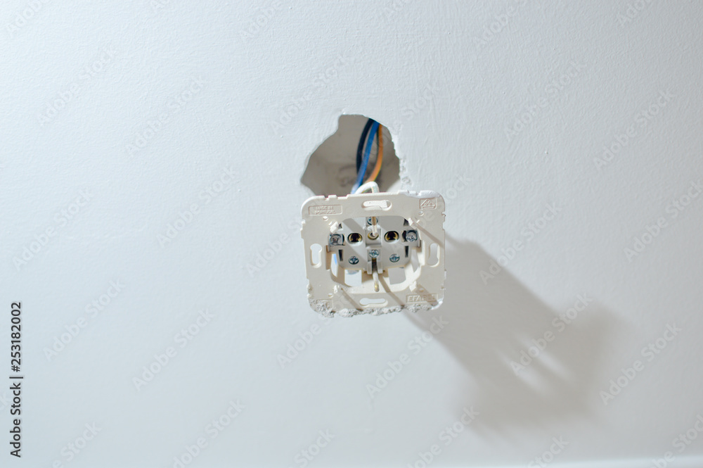 Electric sockets light works mounting and installation on plaster wall ...