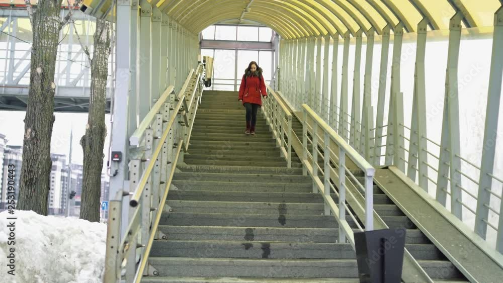 the pedestrian overpass is equipped with a modern ramp for disabled ...