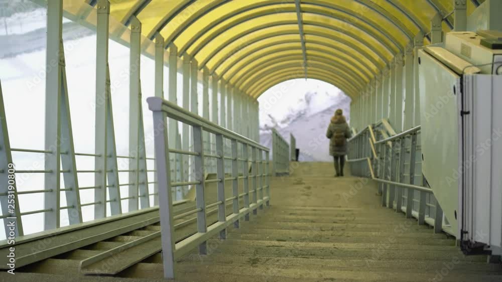 the pedestrian overpass is equipped with a modern ramp for disabled ...