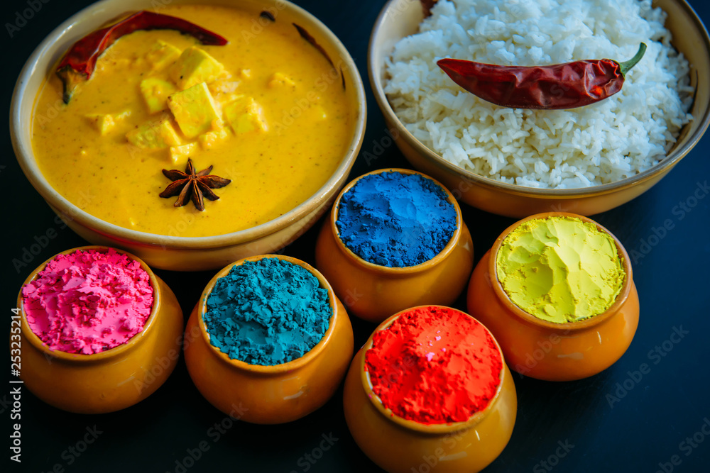 Holi indian festival of colors. Food with colours, steam rice, panir ...