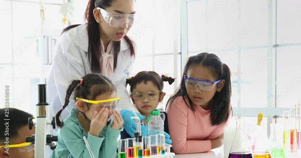 In science class, science Asian teacher wearing balloon to bottle,then ...
