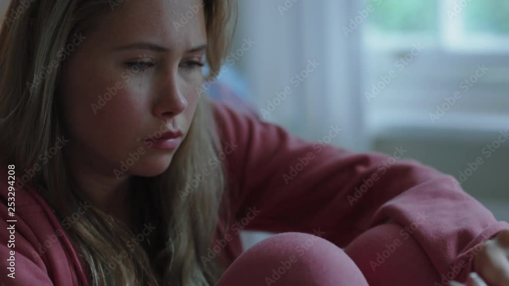 sad teenage girl alone at home feeling depressed moody teen thinking of ...