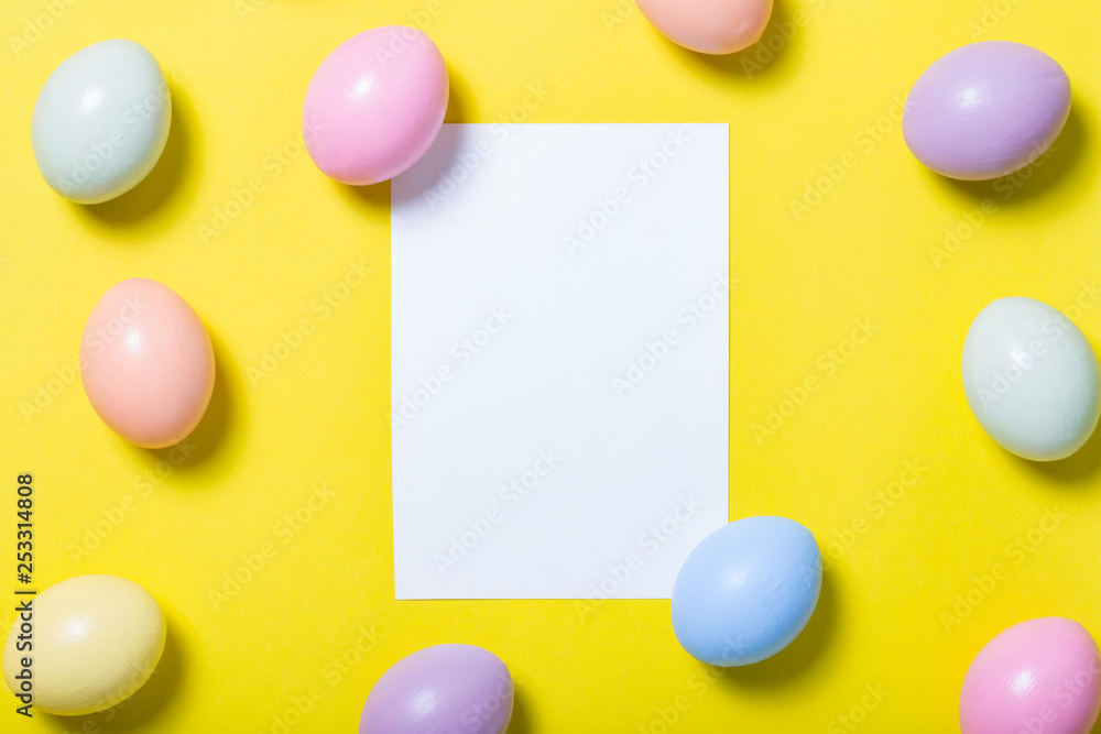 colorful easter eggs on yellow background Stock Photo | Adobe Stock
