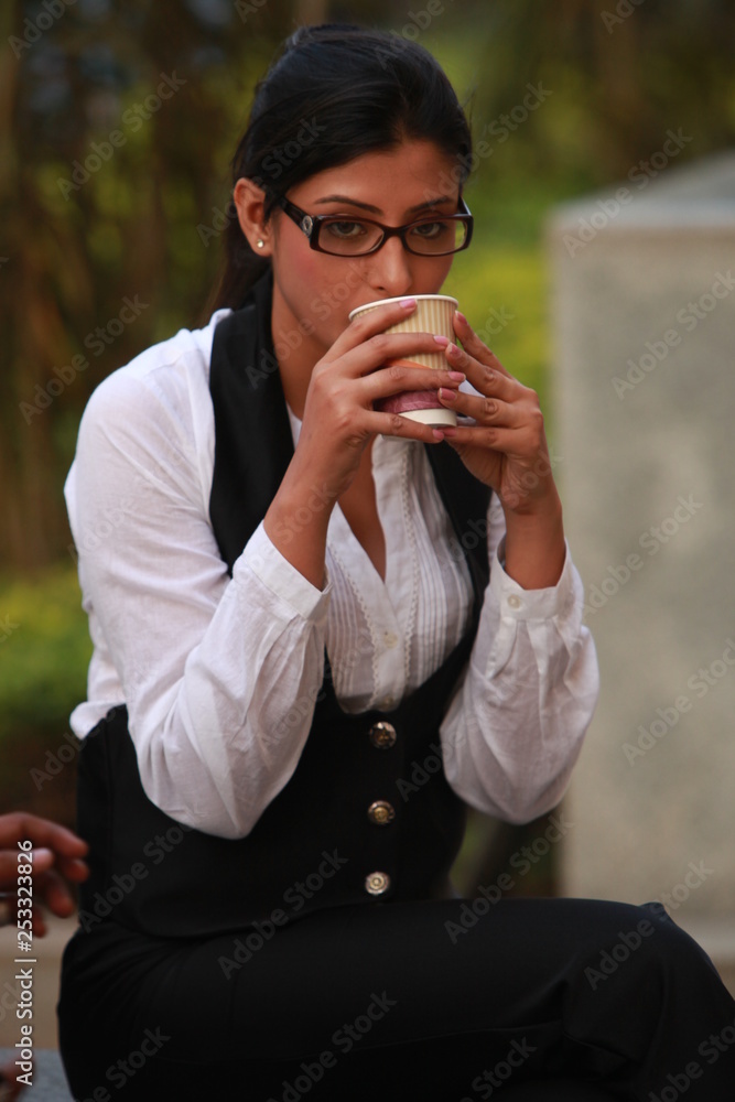 Beautiful business lady in corporate suit posing outdoor wearing ...