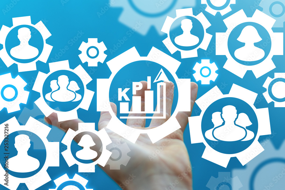 Hand holding a gear icon with kpi growth chart on a virtual screen. KPI ...