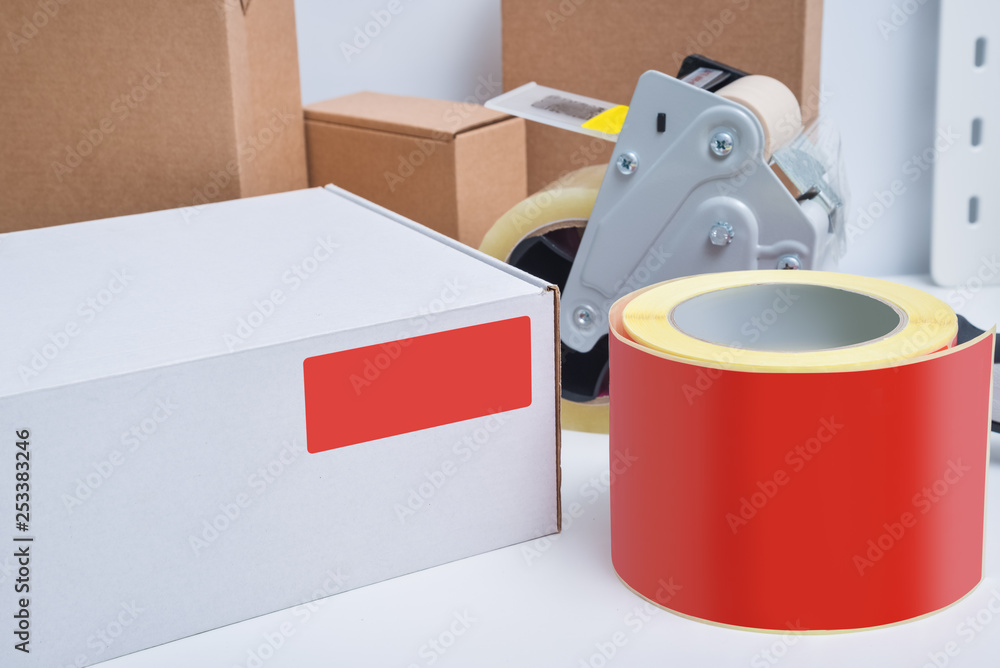 Red sticker marked cardboard box Stock Photo | Adobe Stock