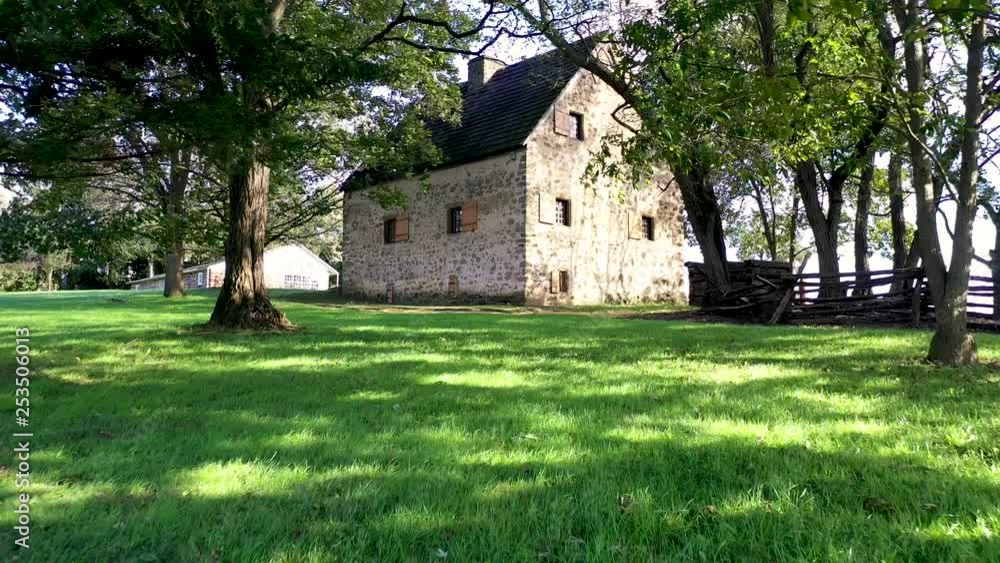 Aerial medium shot low approach to Herr House, a historical landmark ...