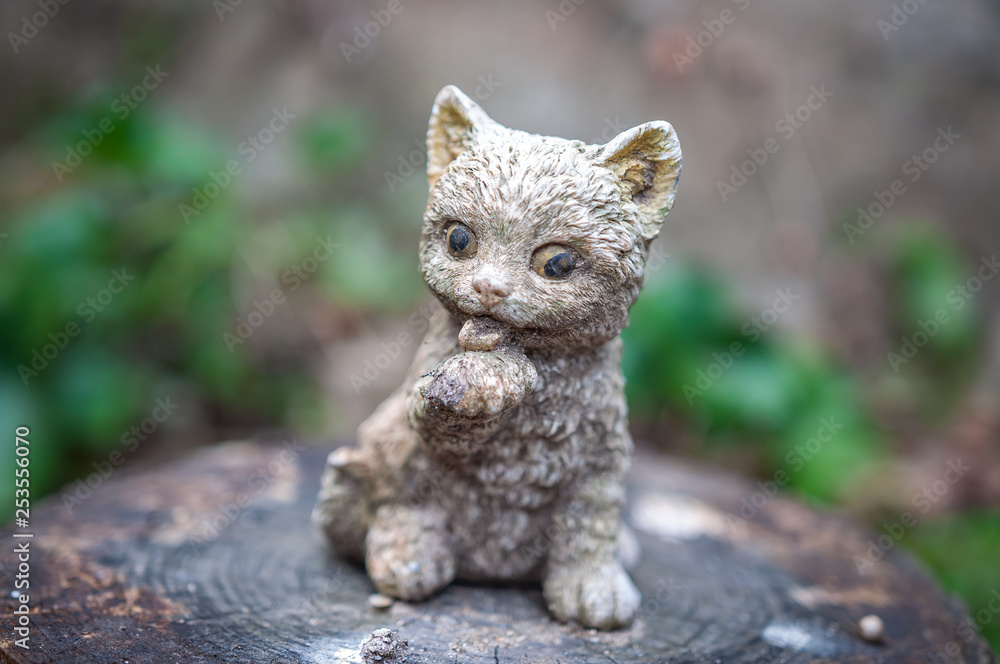 Lucky stone cats which were personally painted by local artist Shunji ...