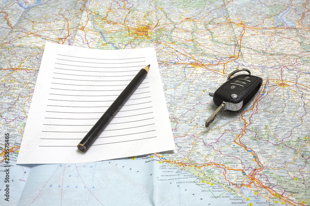 Car keys, pencil and list of notebook on a map of Europe Stock Photo ...