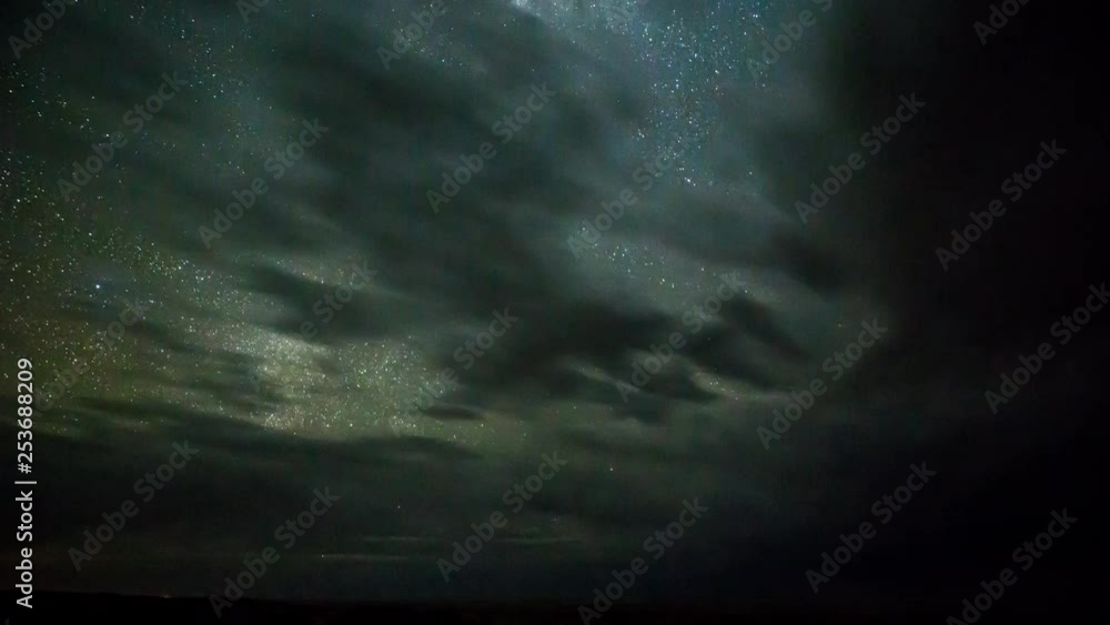 Flashes of lightning on the horizon with storm clouds that quickly ...