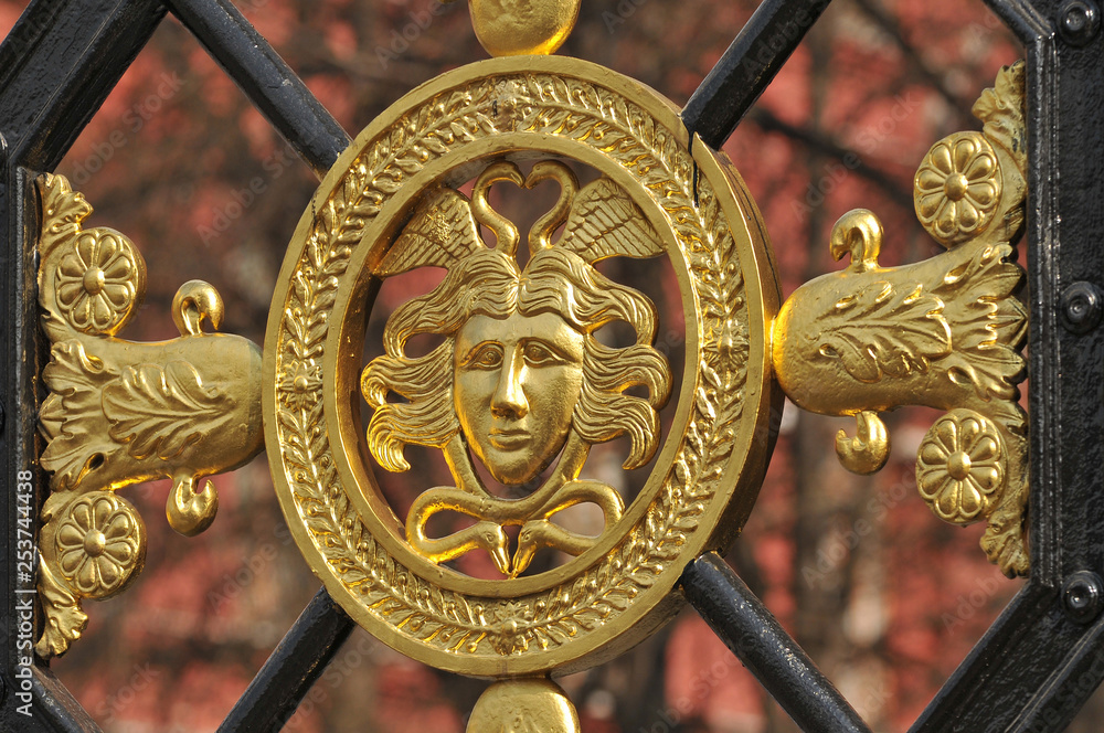 Wrought iron gate in the Alexander Garden near the Historic museum and ...