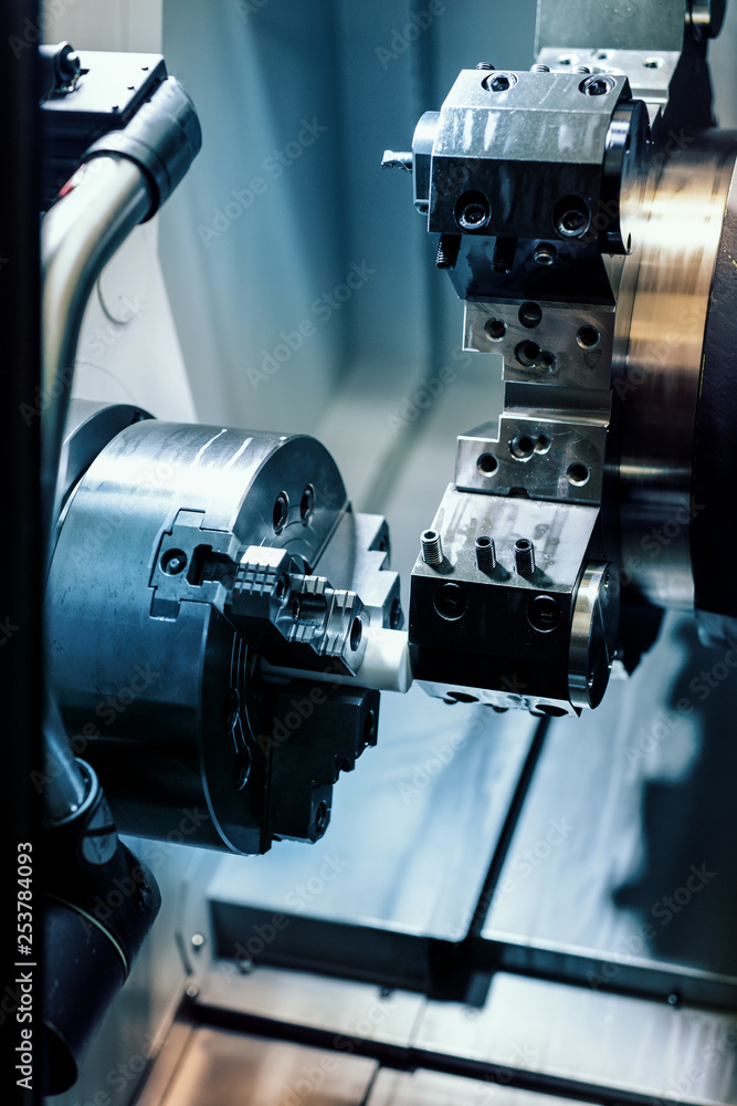 CNC machine tool in metal factory. Stock Photo | Adobe Stock