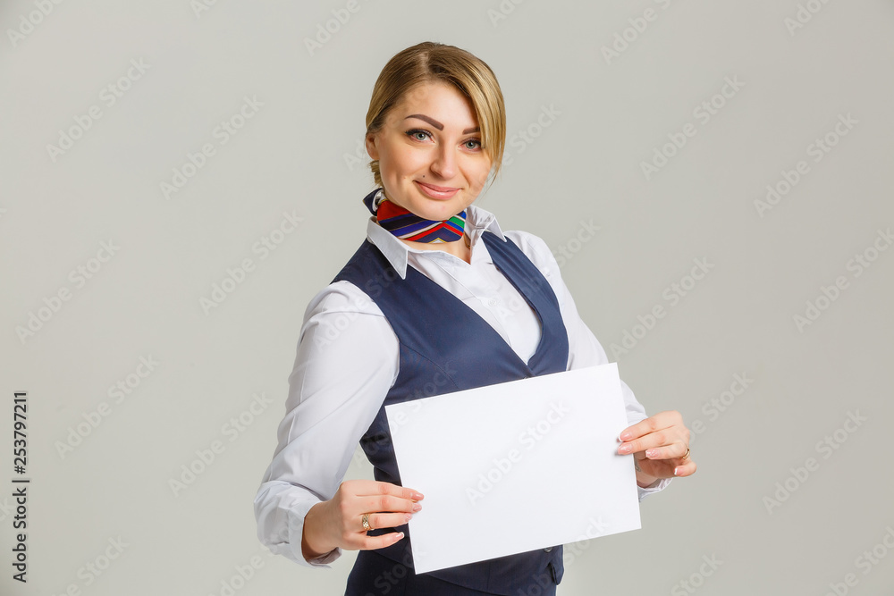 pretty stewardess with a white piece of paper in your hands Stock Photo ...