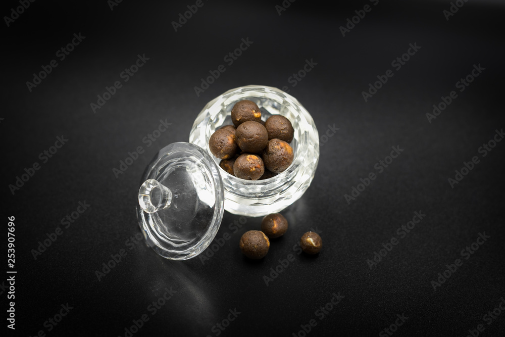 Wormwood salt tamarind bolus elixir,Traditional Thai medicine Stock ...