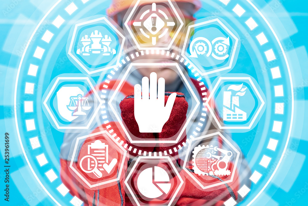 Manufacture worker uses on a virtual screen of the future and touches ...