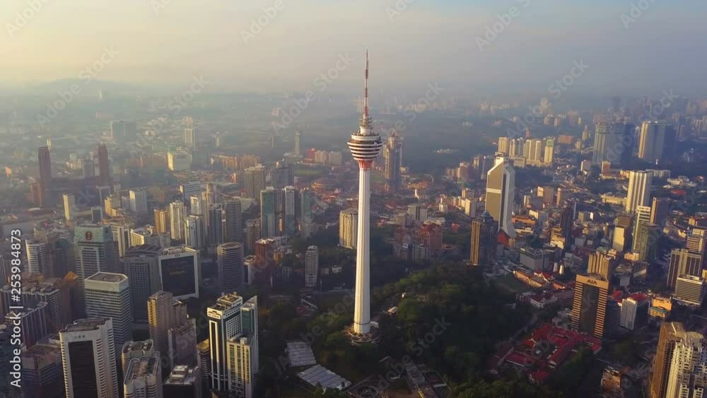 Menara Kuala Lumpur Tower with sunset sky. Aerial view of Kuala Lumpur ...