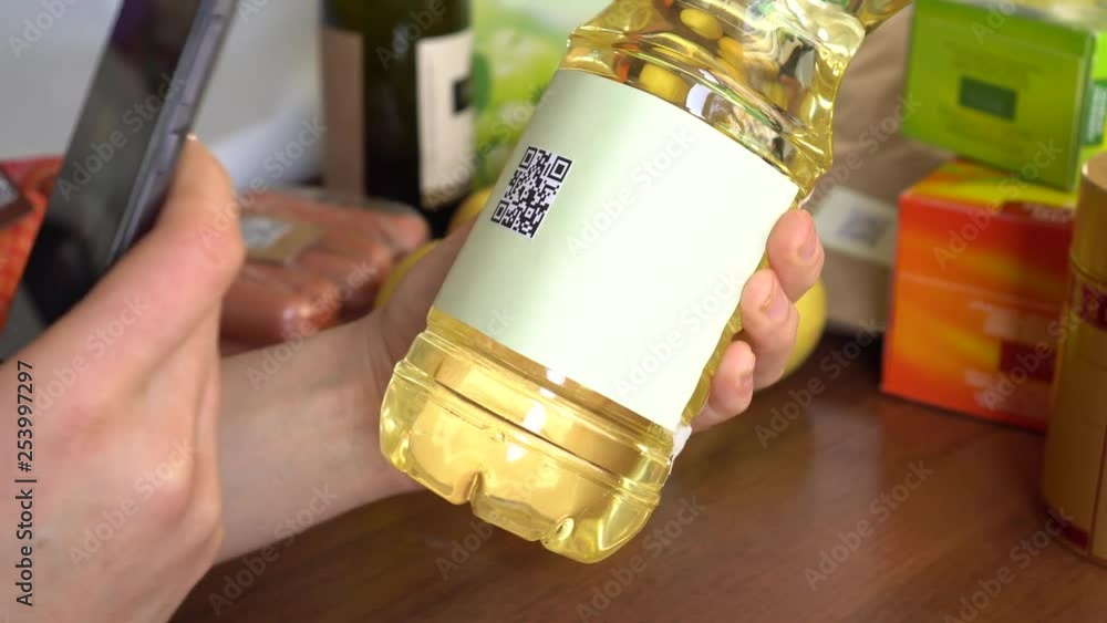 QR Codes on food packaging. Scanning qr codes Stock ビデオ | Adobe Stock