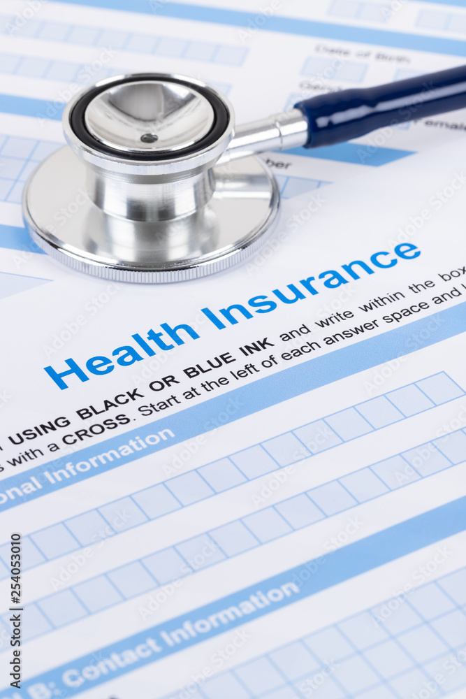 Health insurance application form with stethoscope and calculator Stock ...