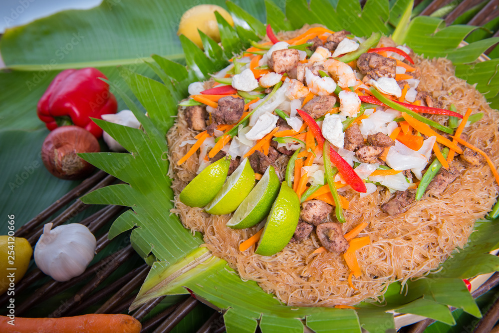 Pancit Guisado Bilao - Filipino noodles Bilao Stock Photo | Adobe Stock