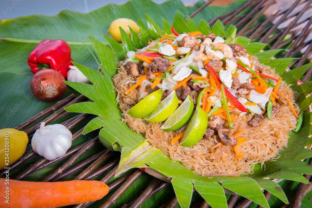 Pancit Guisado Bilao - Filipino noodles Bilao Stock Photo | Adobe Stock