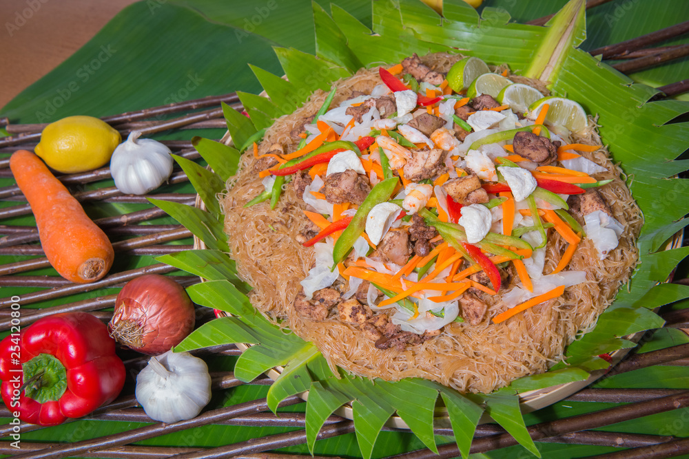 Pancit Guisado Bilao - Filipino noodles Bilao Stock Photo | Adobe Stock