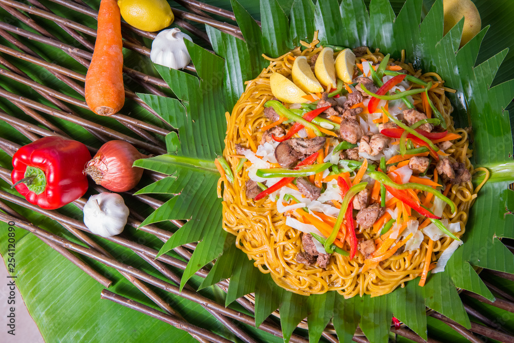 Pancit Guisado Bilao - Filipino noodles Bilao Stock Photo | Adobe Stock