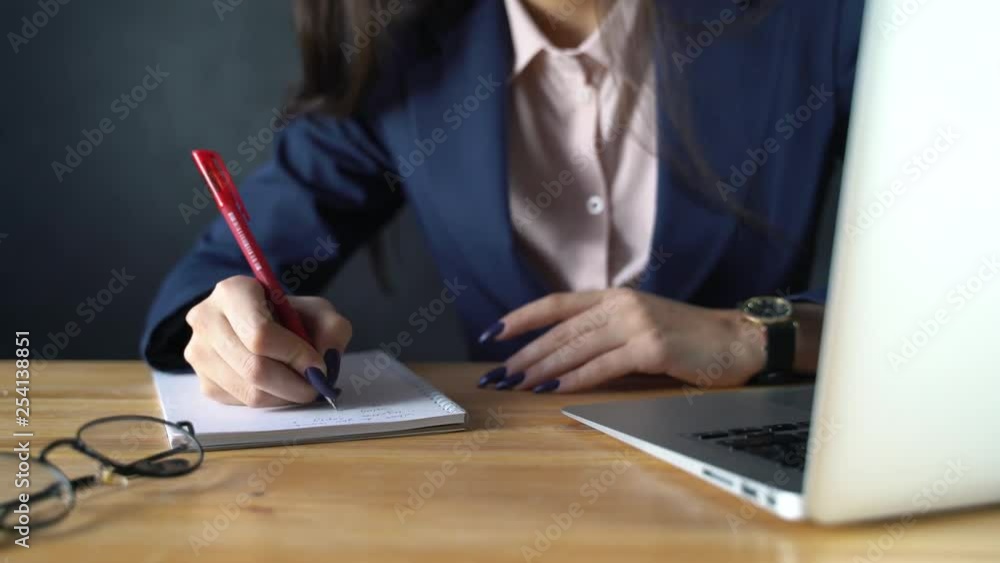The businessman girl is preparing to write down important information ...