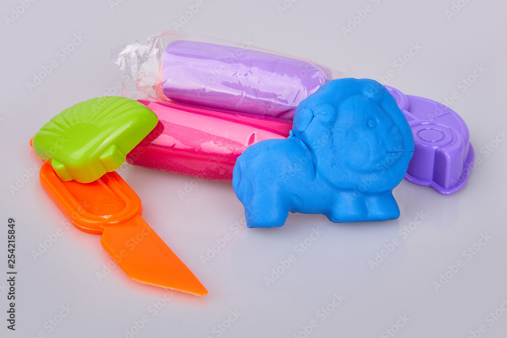 A lion formed from blue play dough (plasticine). Modeling. Play dough ...