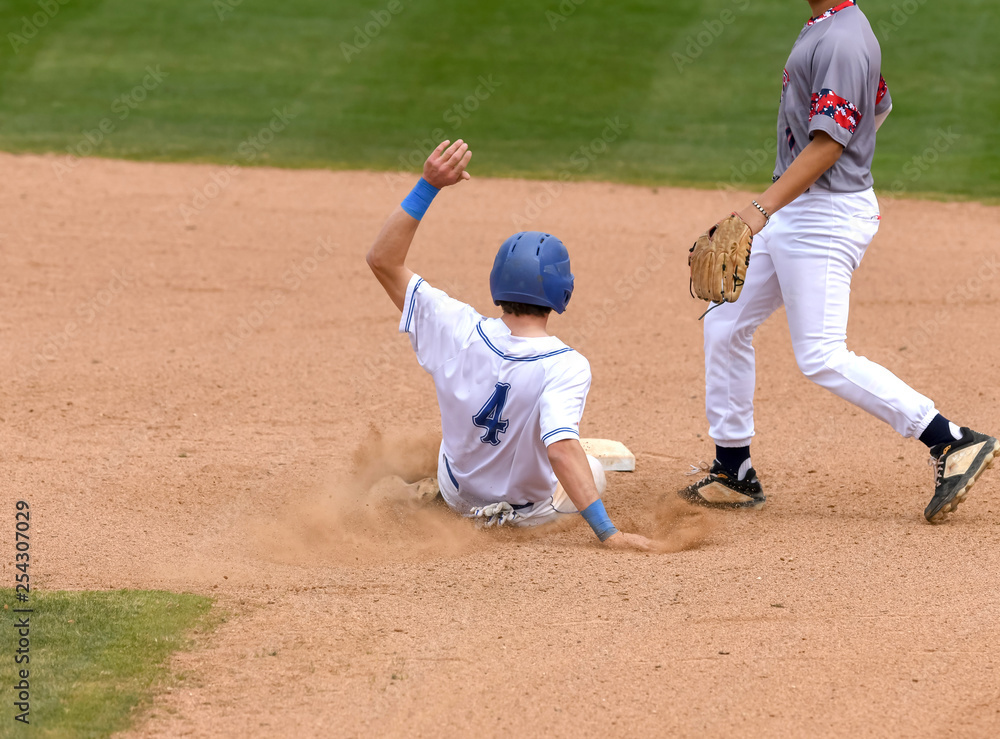 Young athletic boys playing baseball Stock Photo | Adobe Stock