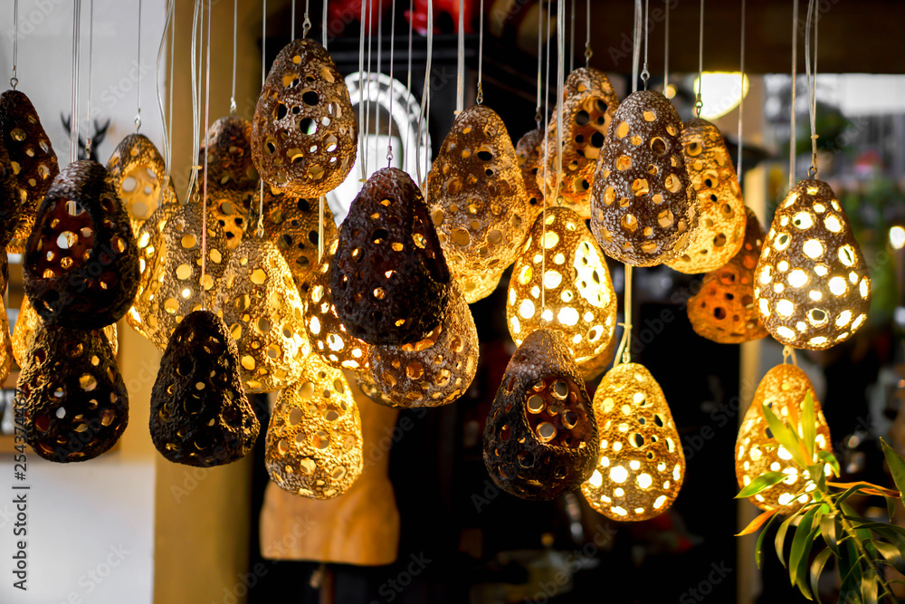 Lamp decorated like bird's nest showing by turn on light in the small ...