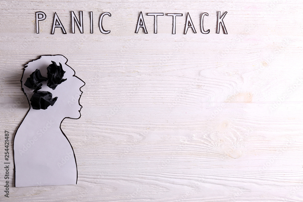 Panic attack and mental health awareness concept. Paper silhouette of a ...